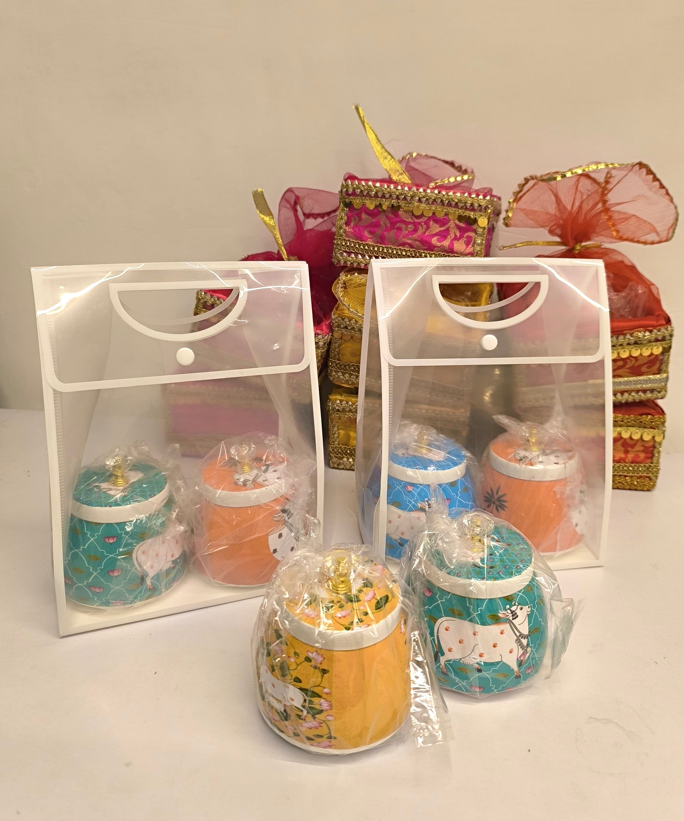Combo of 1 Pvc Bag and 2 Pichwai Floral metal meenakari jars / Return ...